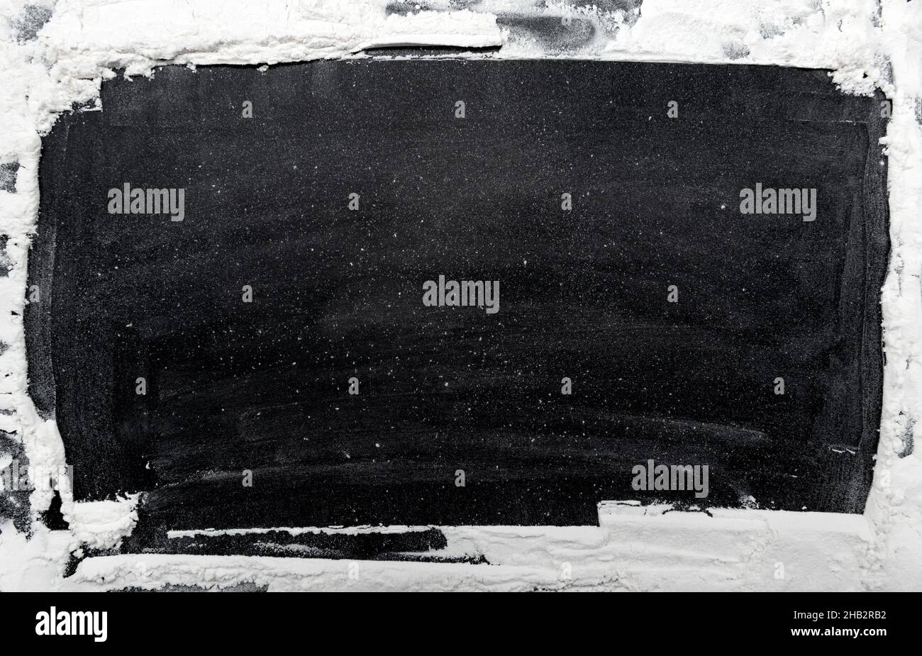 Frame made of rectangular flour on a black background for inscriptions ...