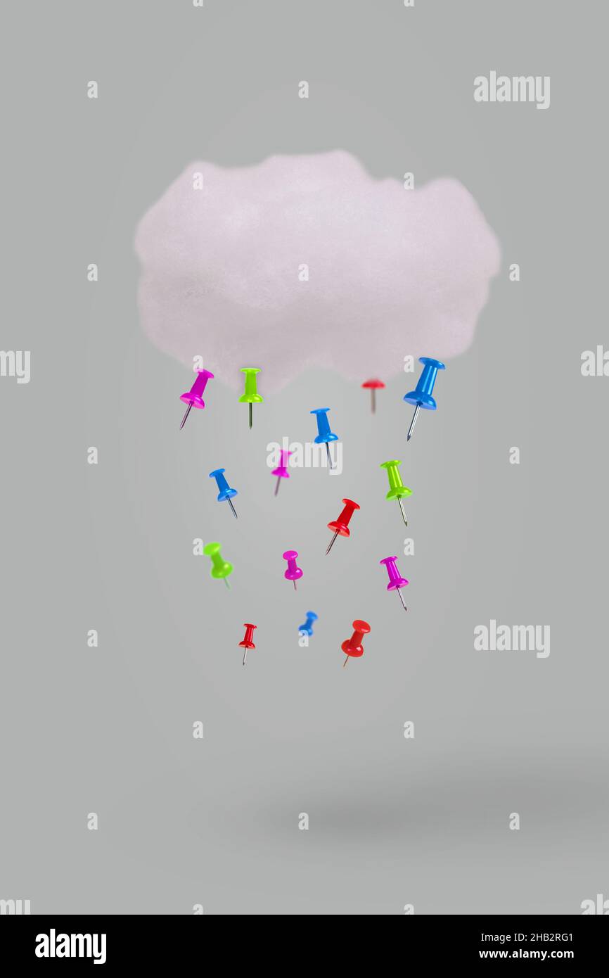 Creative idea made with cloud and push pins as rain isolated against ...