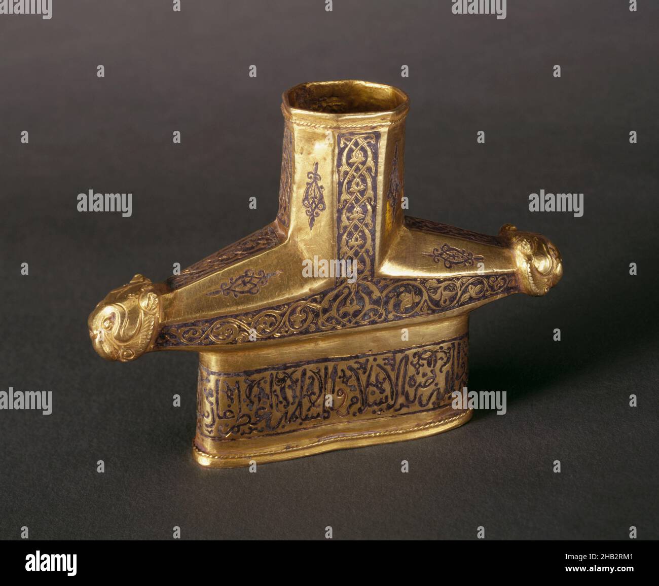 Sword Hilt with Design of Lion Heads, Arabesque Scrollwork, and Arabic ...
