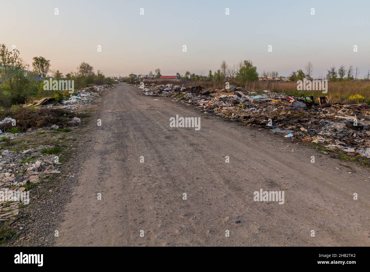 Road through a landfill in Rasht, Iran Stock Photo - Alamy