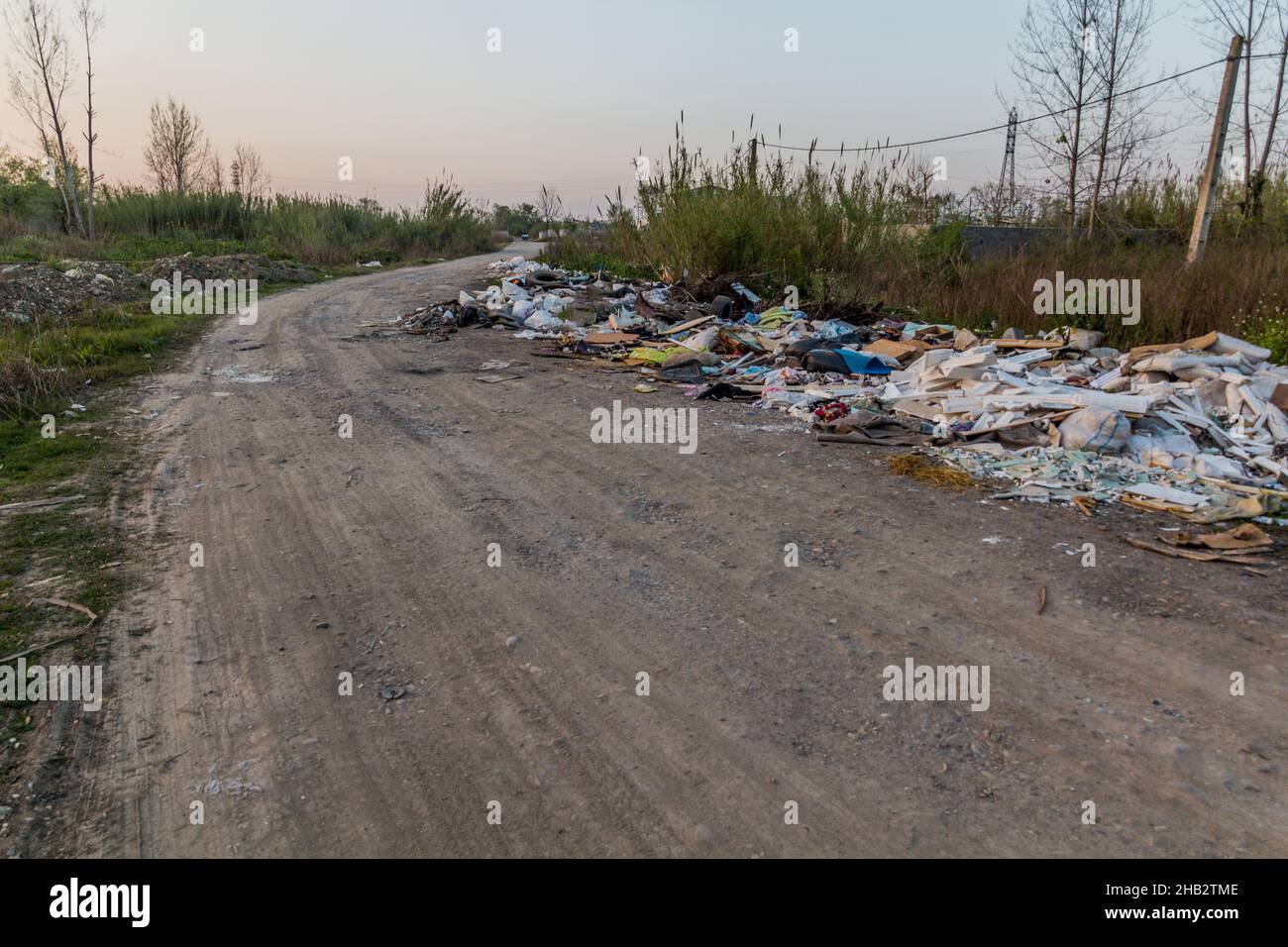 Road through a landfill in Rasht, Iran Stock Photo - Alamy