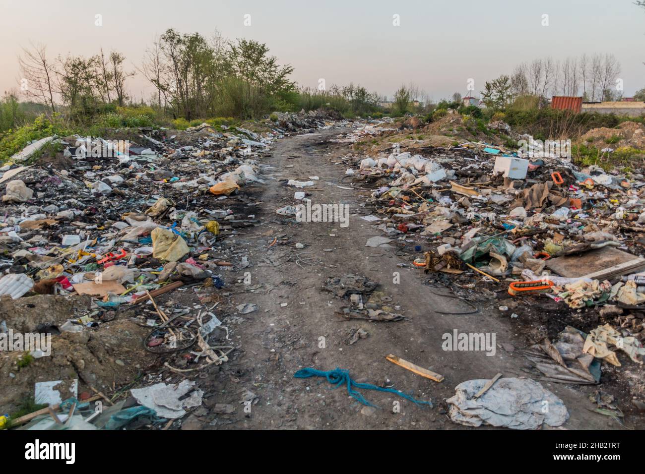 Road through a landfill in Rasht, Iran Stock Photo - Alamy