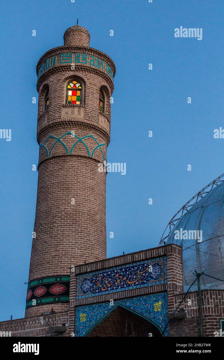 Evening view of a minaret of a small mosque in Ardabil, Iran Stock ...