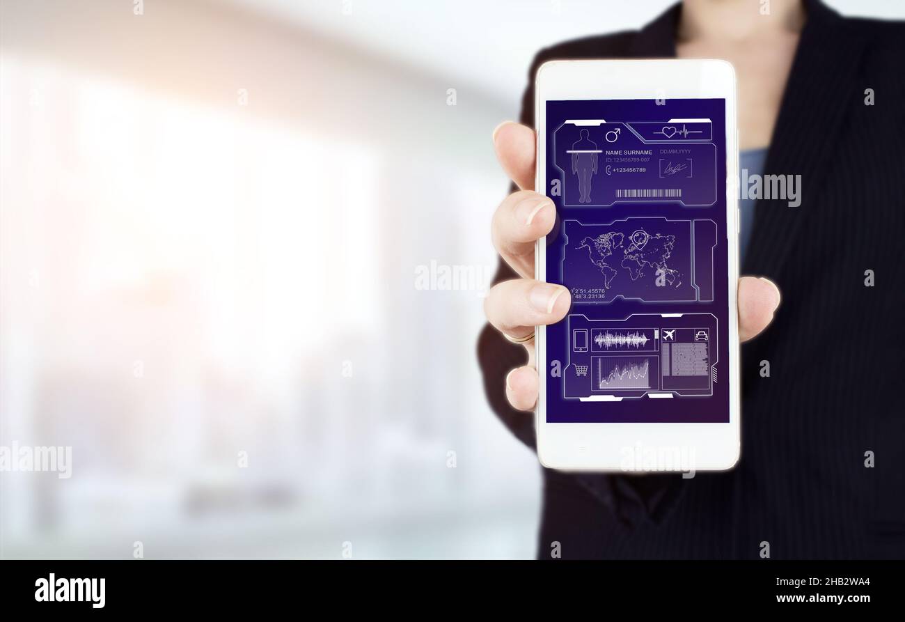 Biometric and security concept. Hand hold white smartphone with digital ...