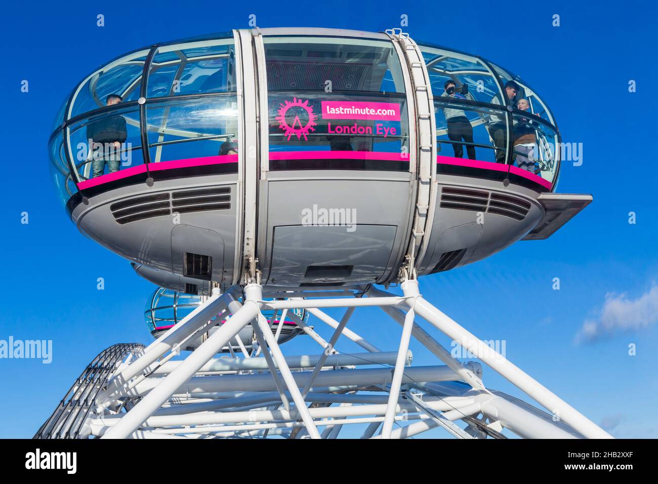 Visitors enjoying the views from London Eye pod at Southbank, London UK ...