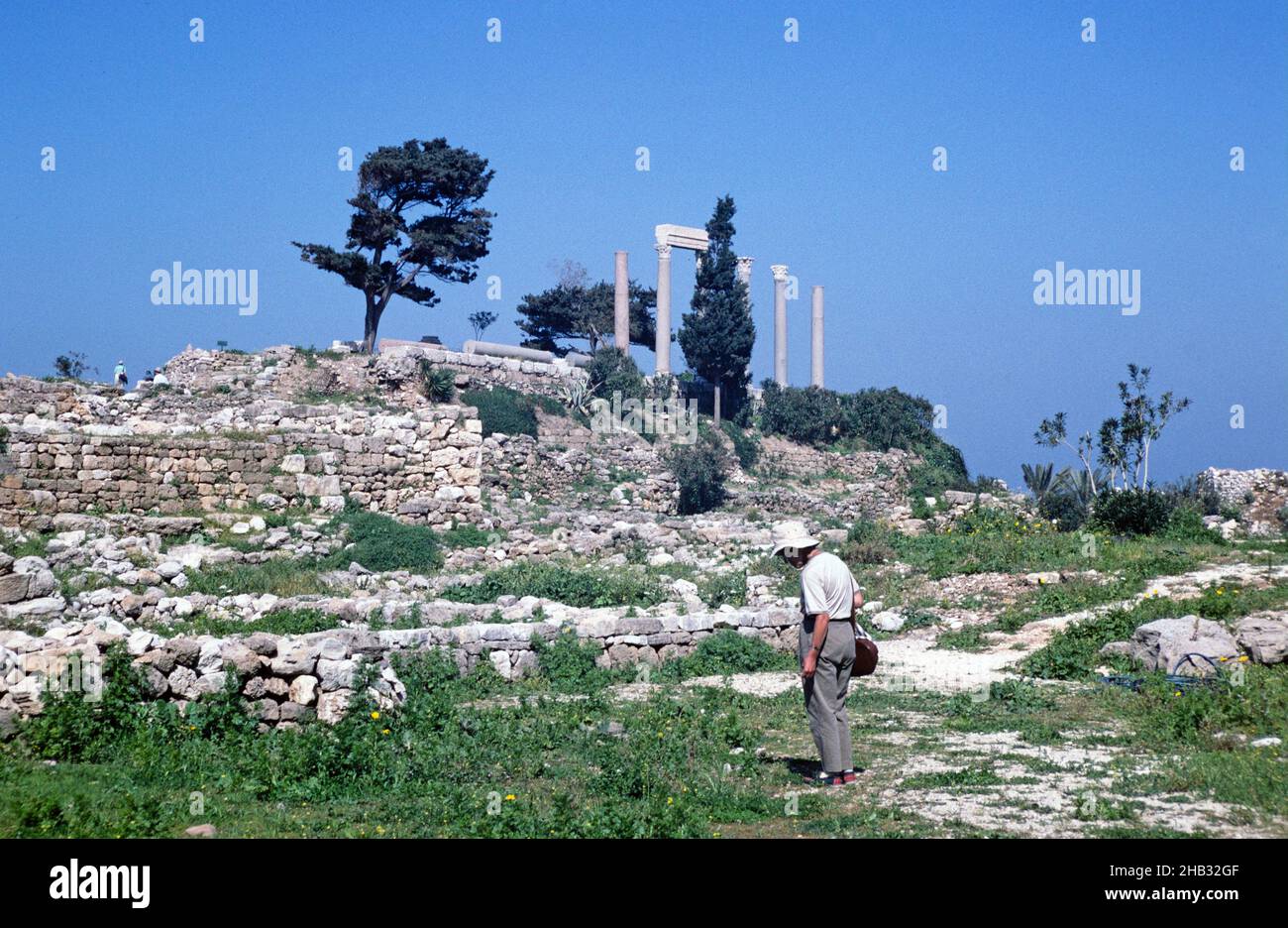 Tourist at the archaeological site ruins of ancient Byblos, Lebanon ...