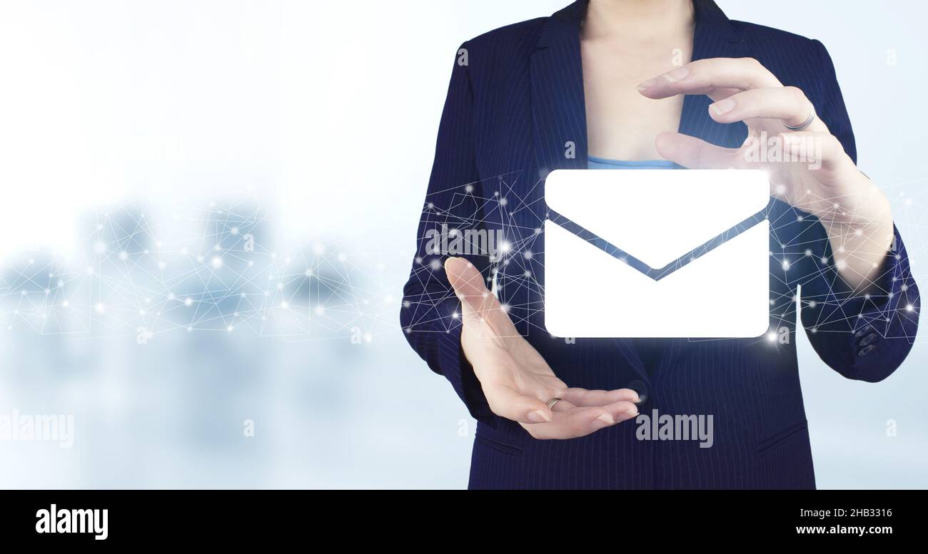 Email and sms marketing concept. Two hand holding virtual holographic ...