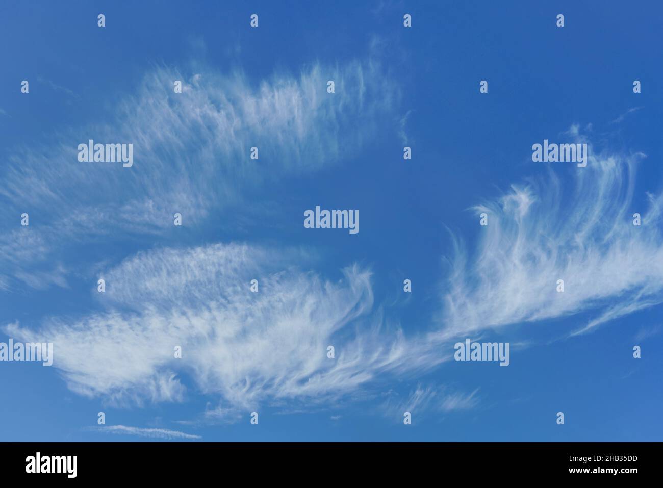 Bright winter sky with few cirrus clouds Stock Photo - Alamy
