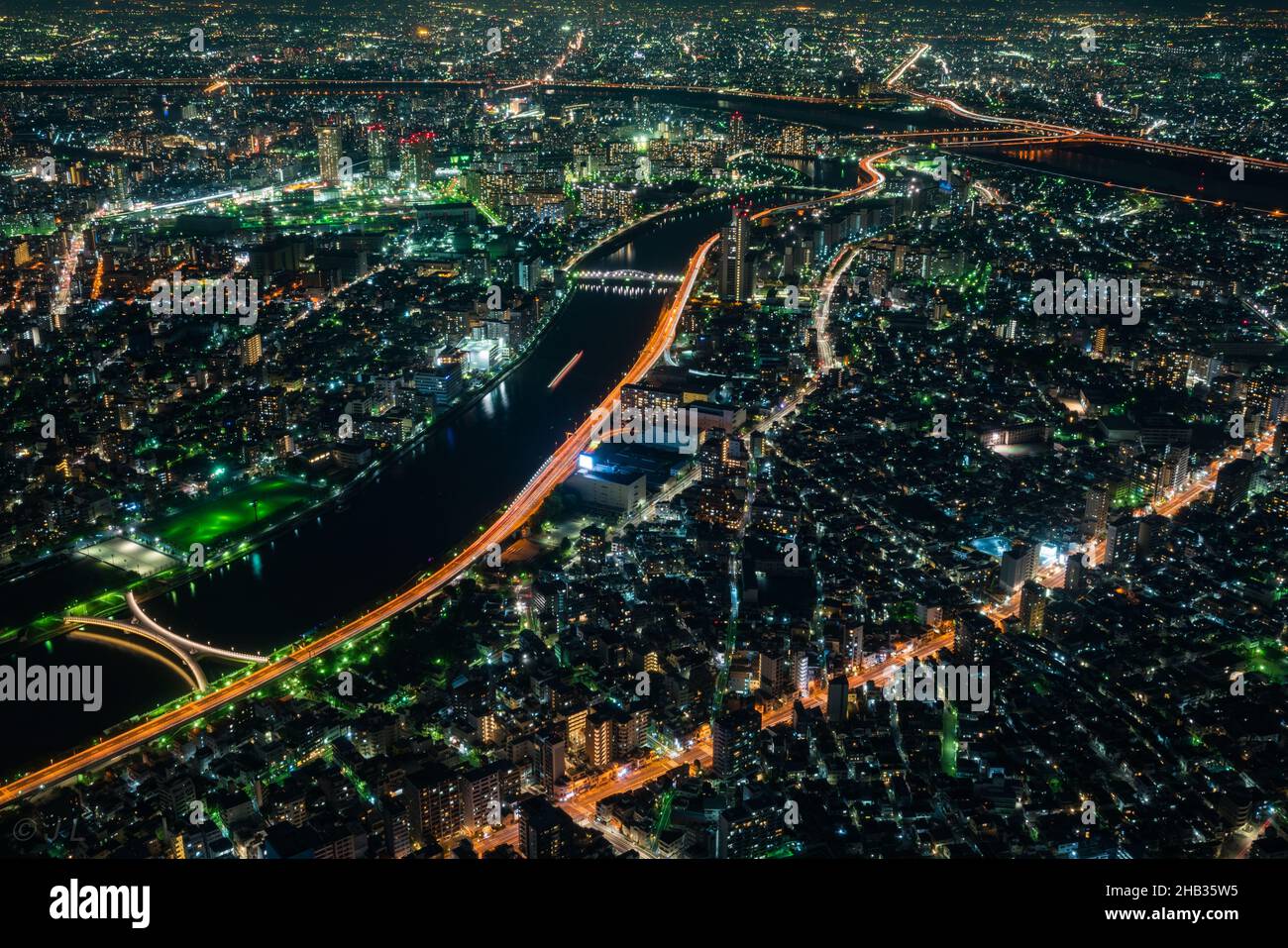 The illuminated city of Tokyo with the Sakura-bashi and Shirahige ...