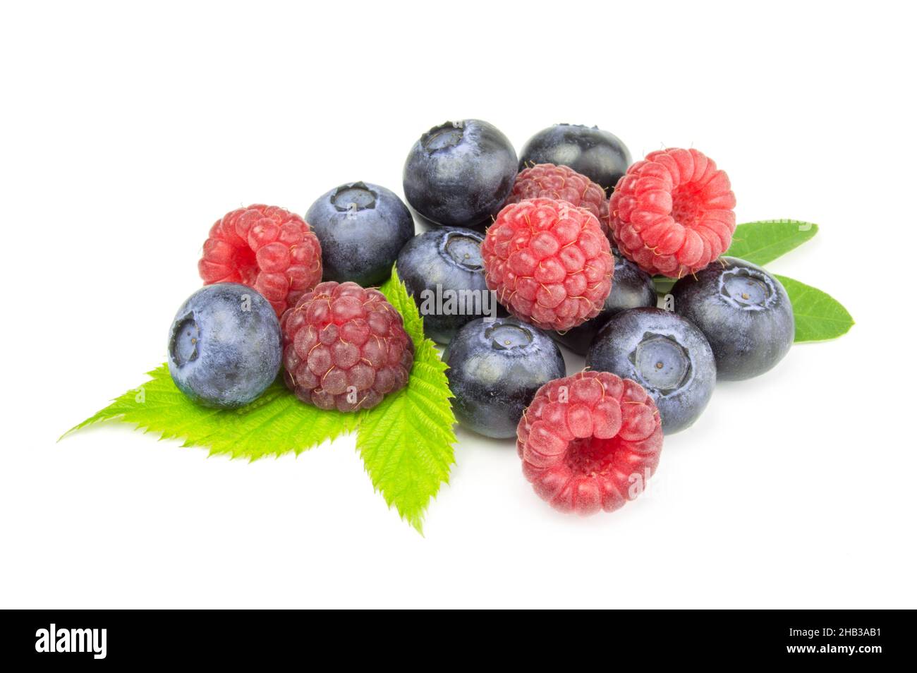 Blueberry and raspberries on white background Stock Photo - Alamy