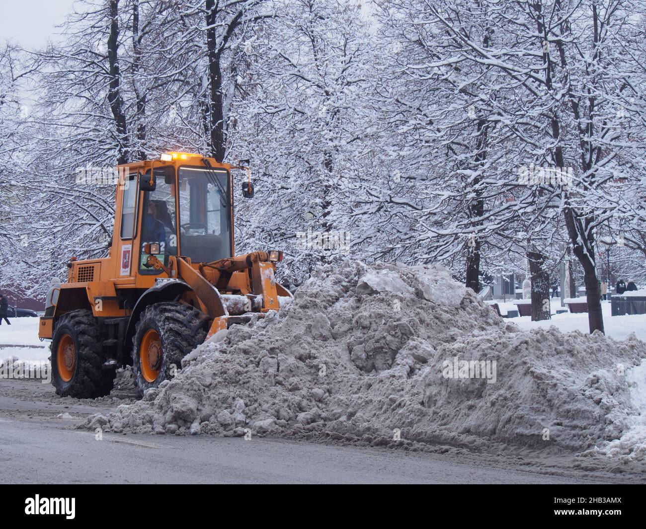 A Snowplow removes snow on the street. (Photo by Alexander Sayganov ...
