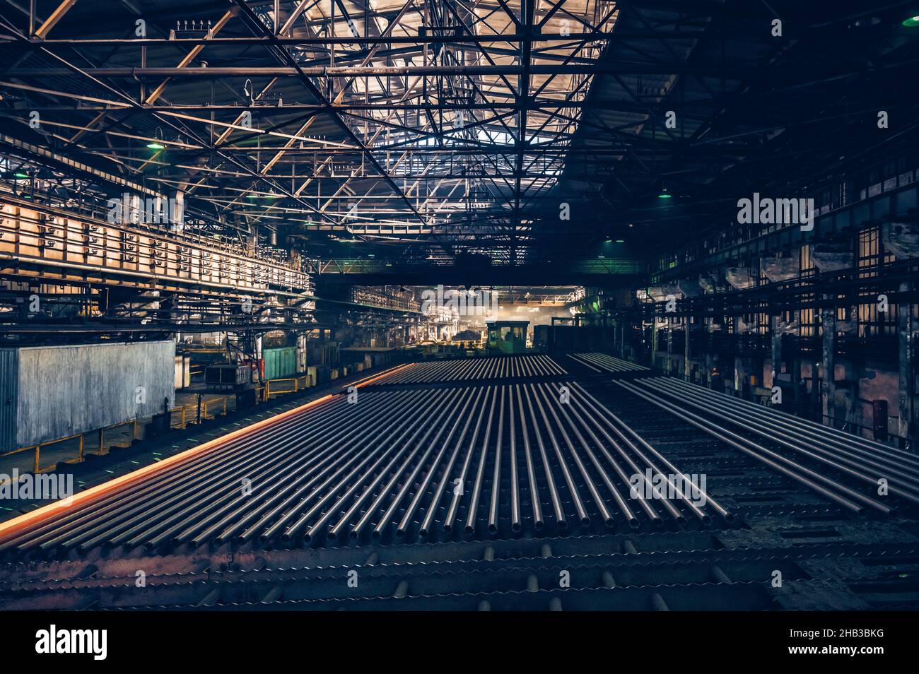 Close-up view of steel pipes in Iron and Steel Factory or Pipe Mill ...