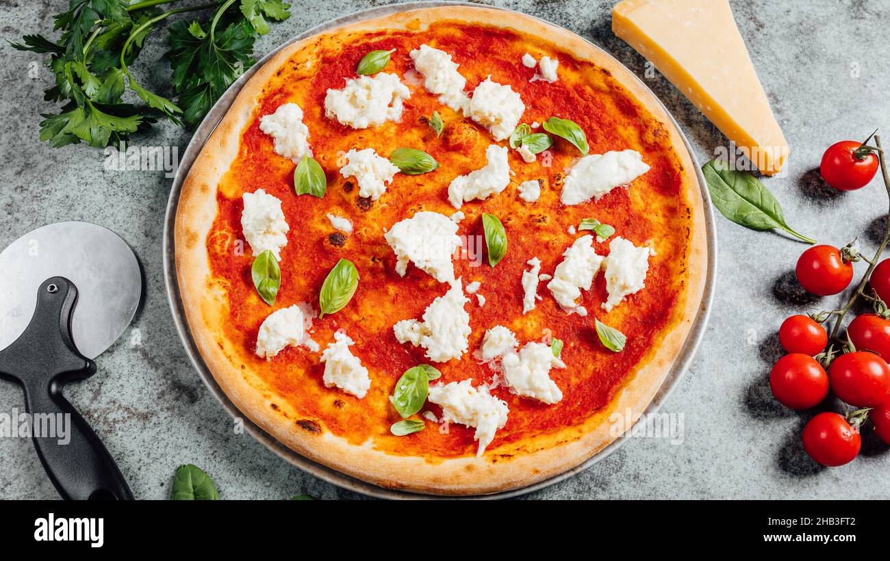 Top view of fresh Italian Pizza Margherita with mozzarella and basil ...