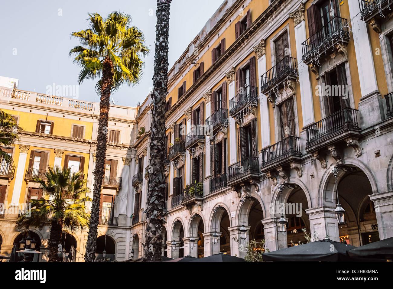 Apartment buildings on european square in old city. Windows with ...