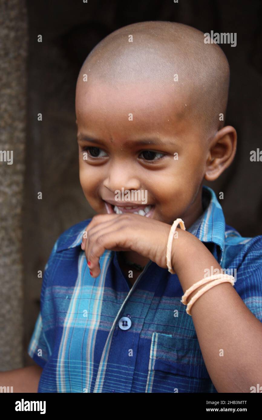 Cute Indian baby who looks to the future with confidence near the ...