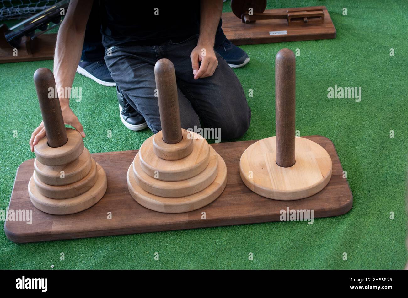 Concept of creative logical thinking. Wooden blocks. Geometric shapes ...