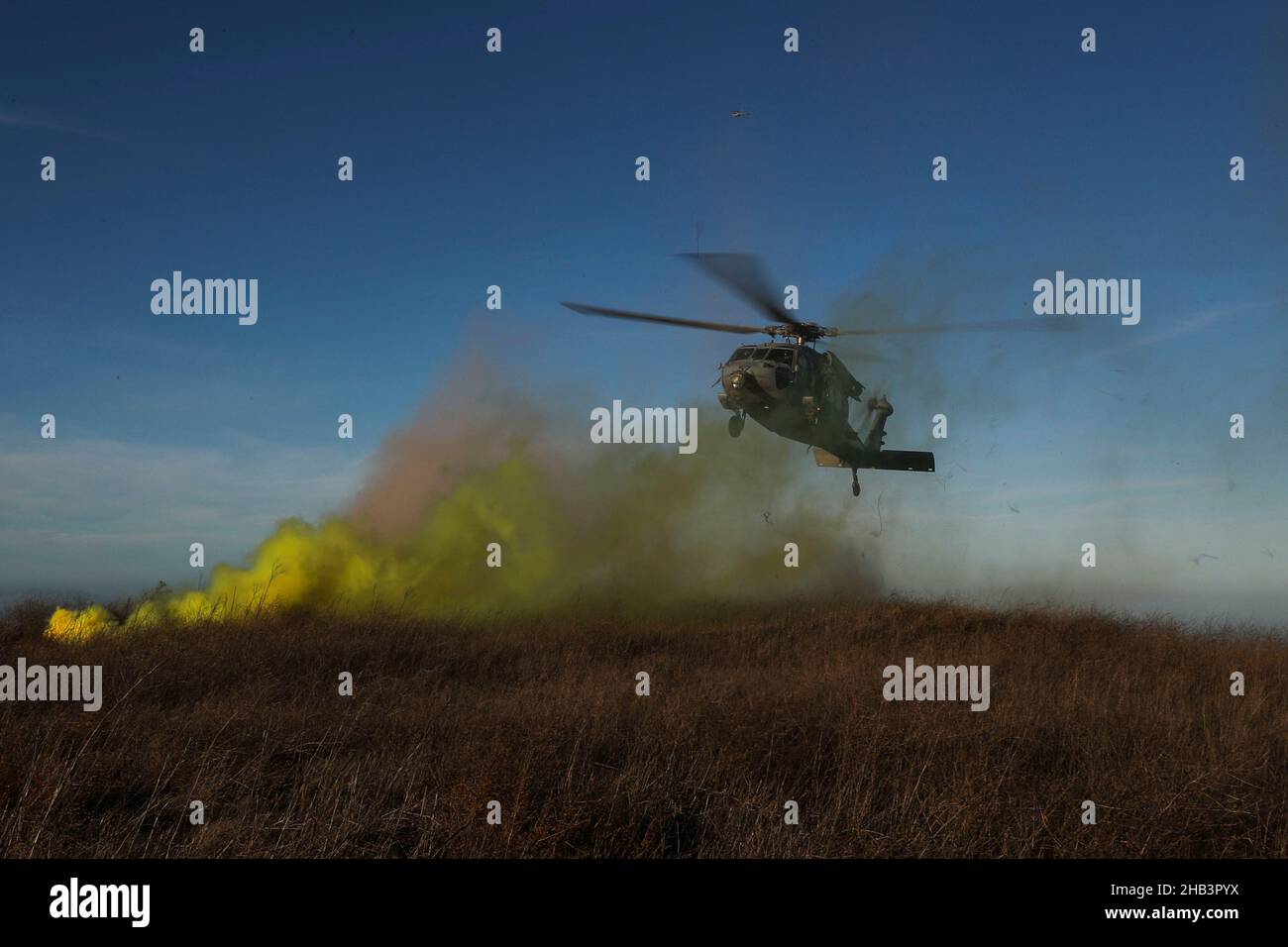 211024-N-OP825-0112 SAN CLEMENTE ISLAND (Nov. 24, 2021) An MH-60S ...