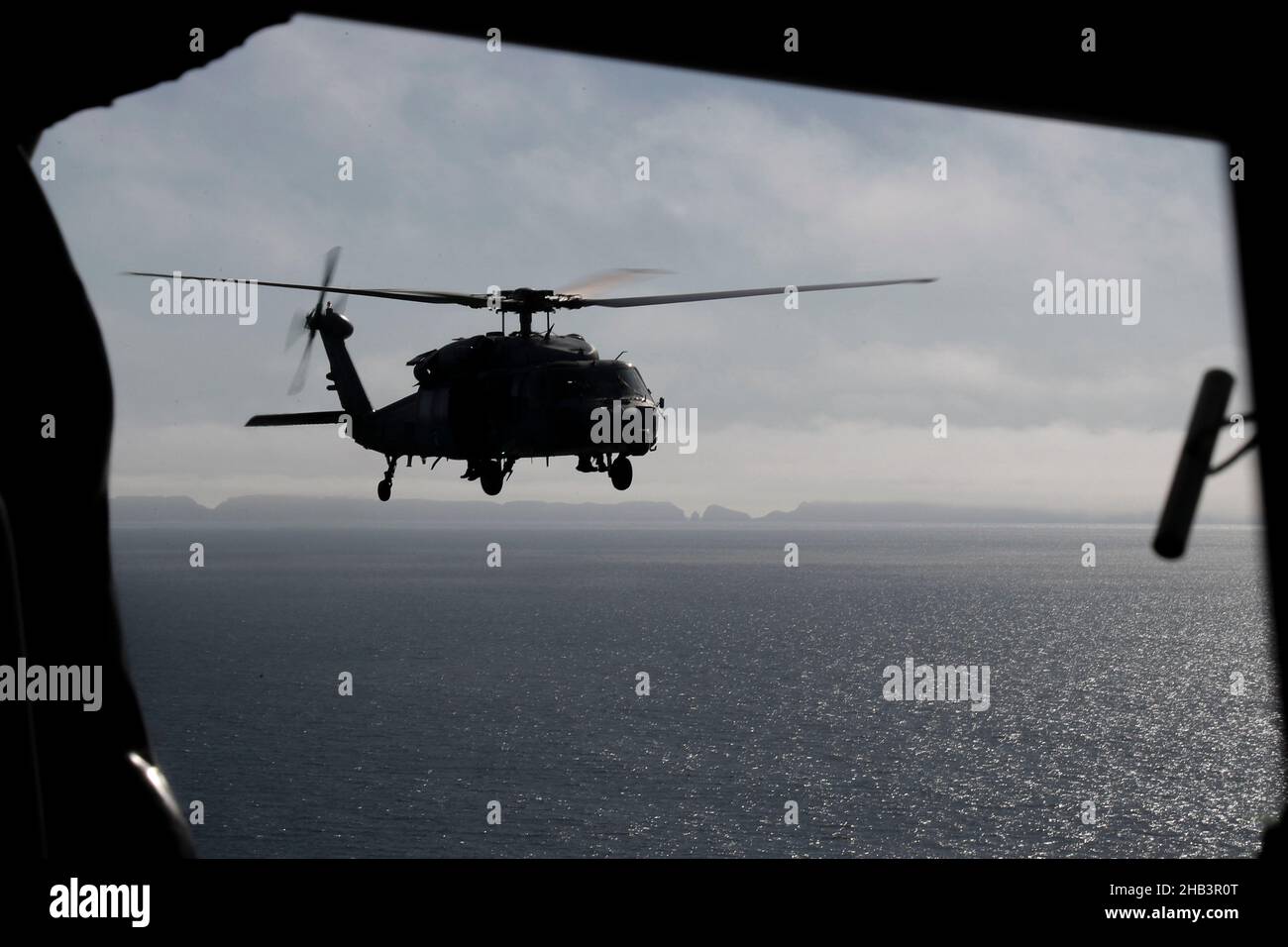 211021-N-OP825-1026 SAN CLEMENTE ISLAND (Nov. 21, 2021) An MH-60S ...