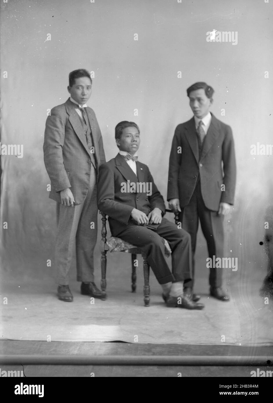 Three young chinese men Black and White Stock Photos & Images - Alamy