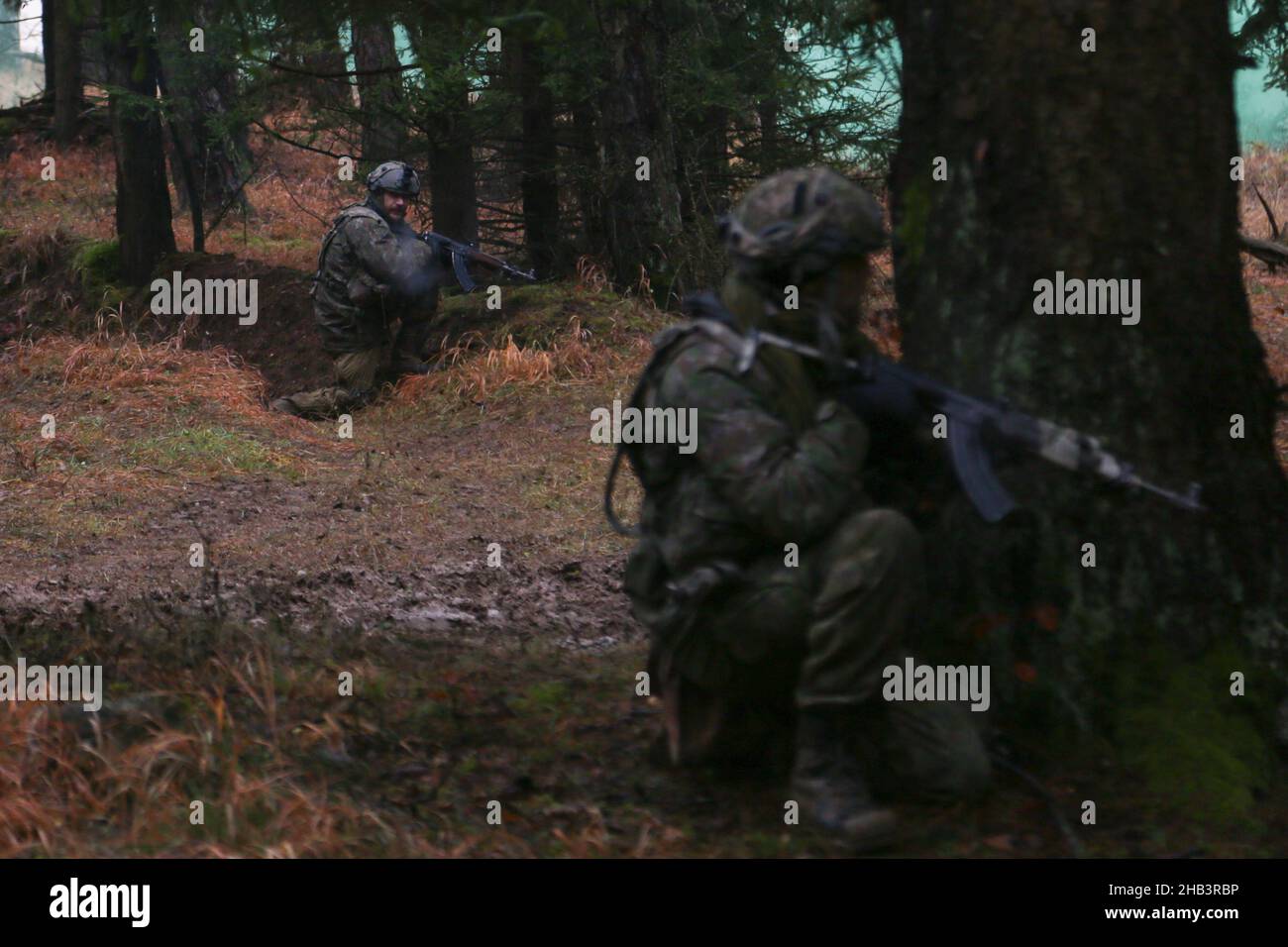 Slovakian soldiers take cover and provide security during Combined ...