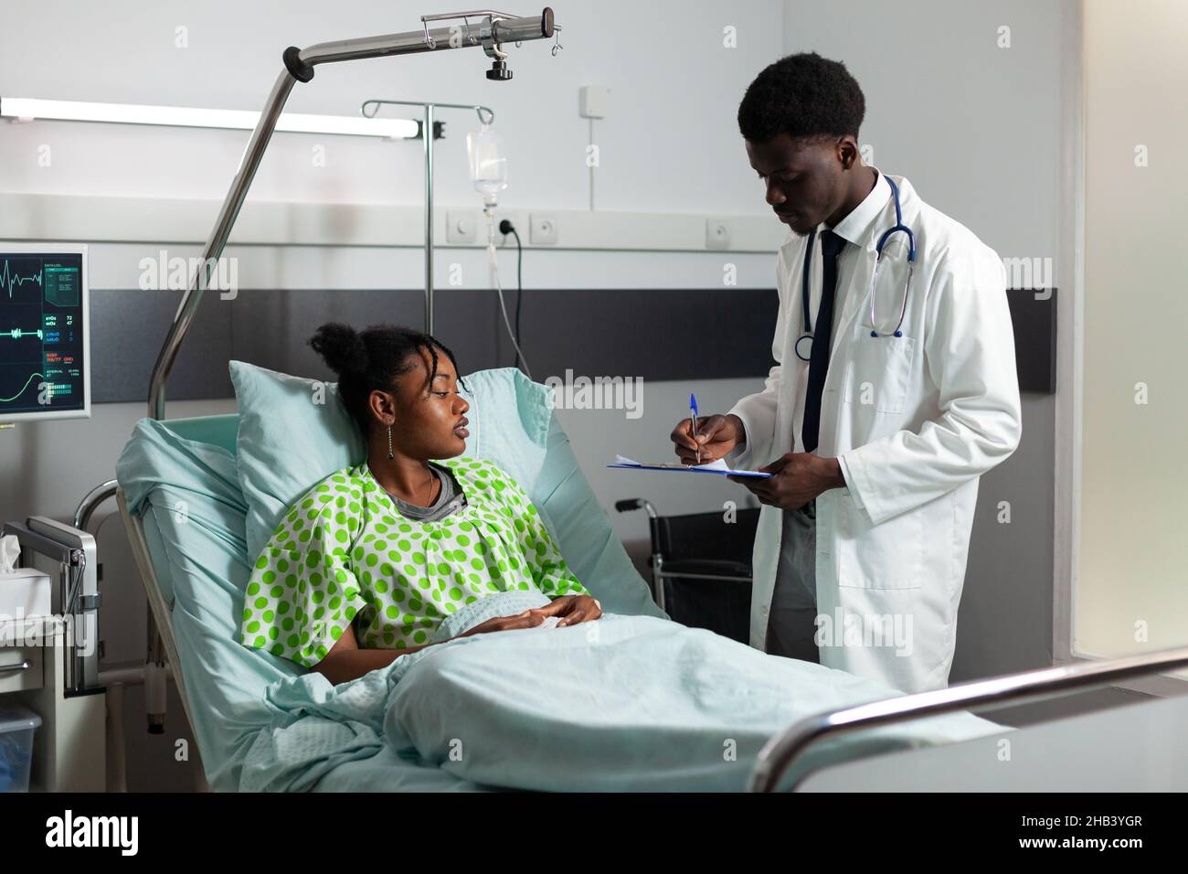 African american practitioner doctor explaining sickness expertise to ...