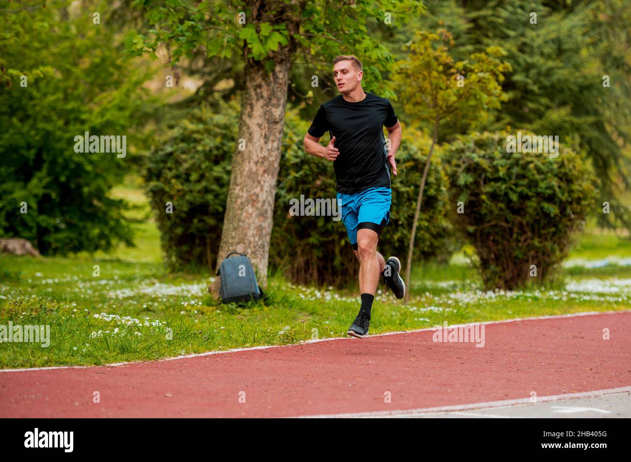 Running man. Male runner at sprinting speed training for marathon ...
