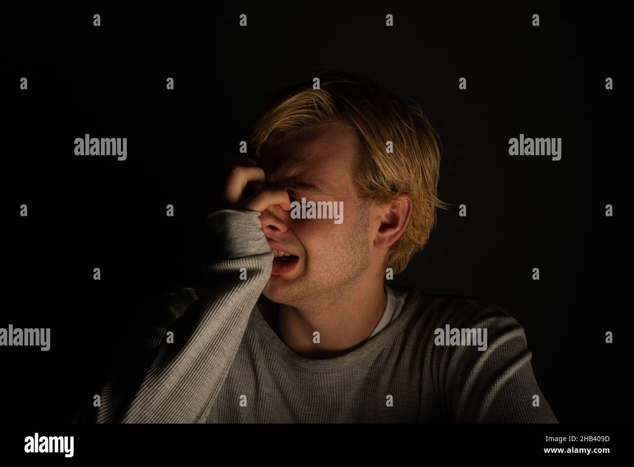 Portrait of broken boy trying to hurt himself while crying Stock Photo ...