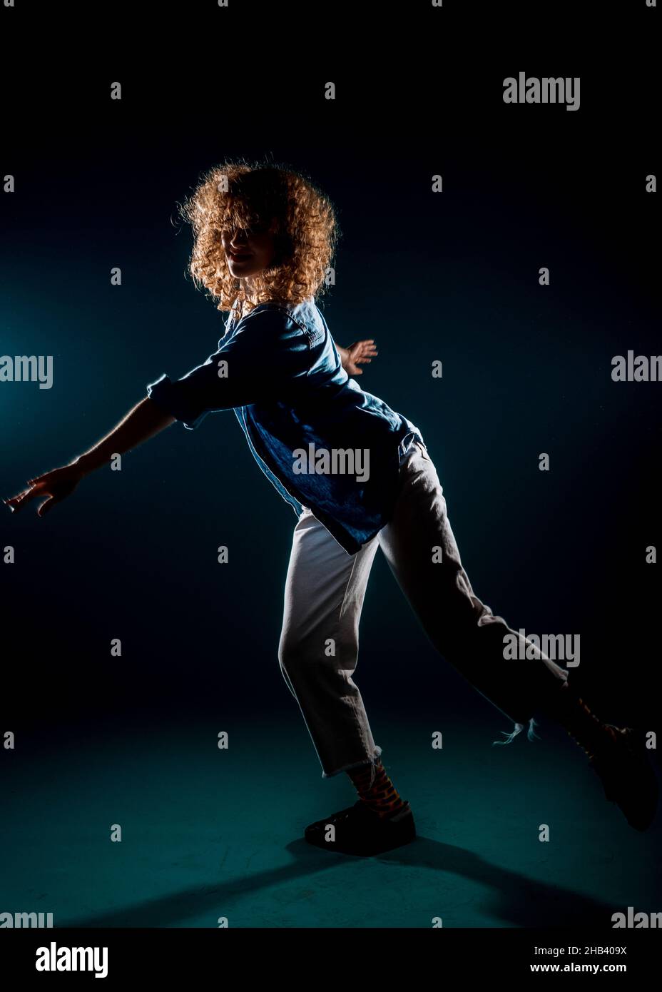 Modern dancing woman performing modern style dance moves Stock Photo ...