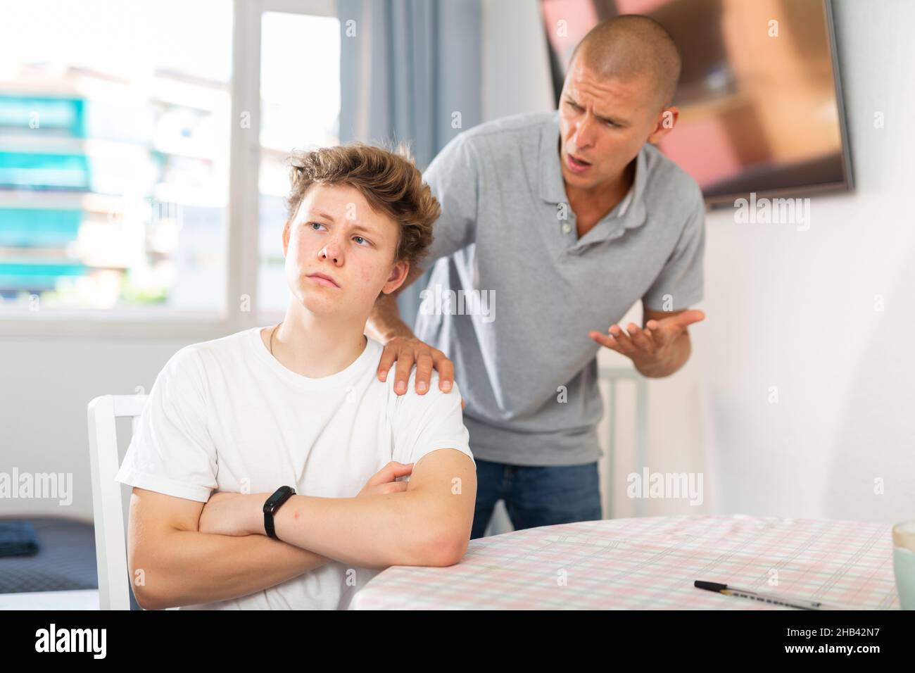 Dad shouting at his son Stock Photo - Alamy