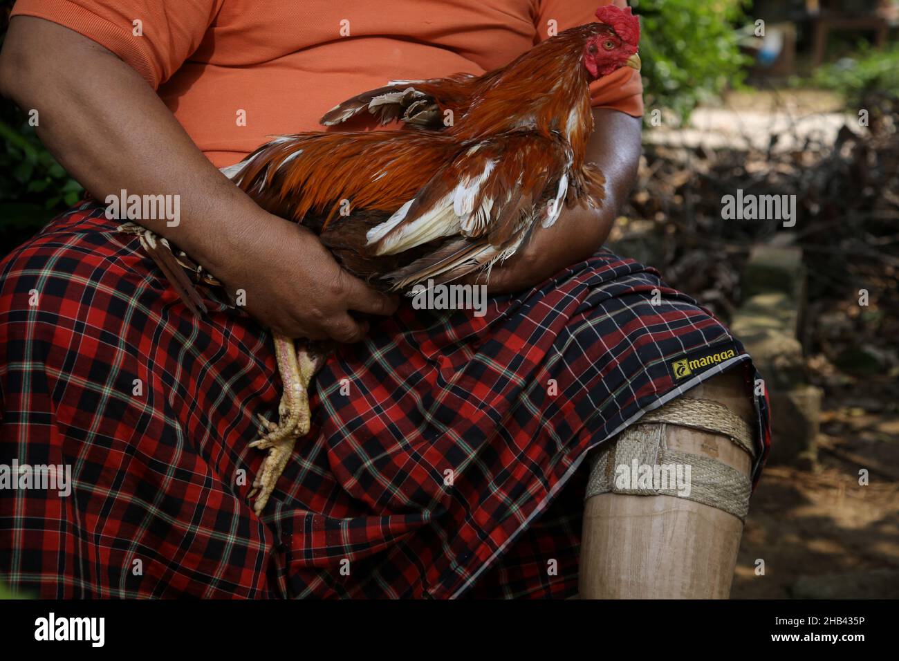 East Timorese, Indonesia. 16th Dec, 2021. Suparni, 65, a retired East ...