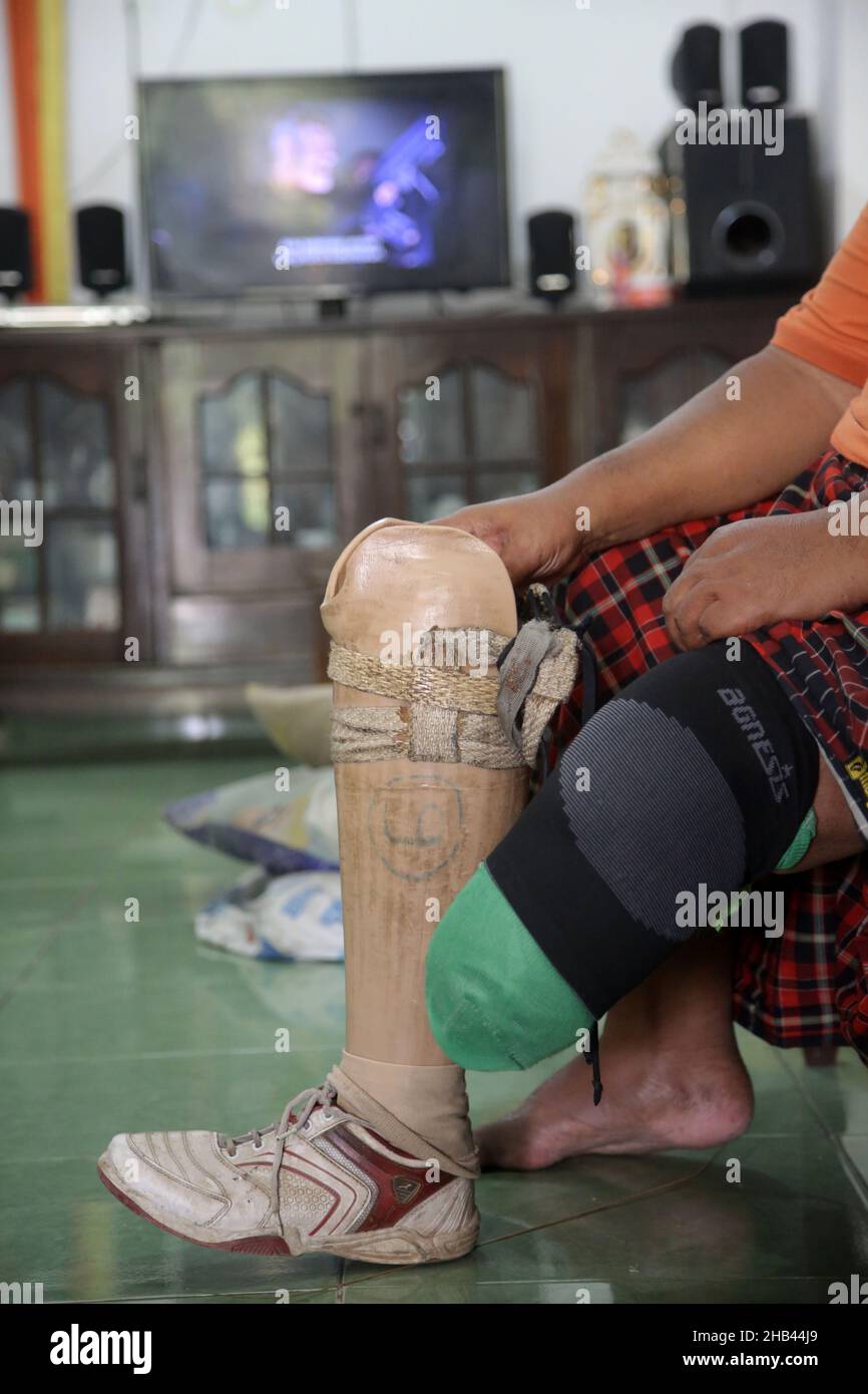 Bekasi, West Java, Indonesia. 16th Dec, 2021. Suparni, 65, a retired ...