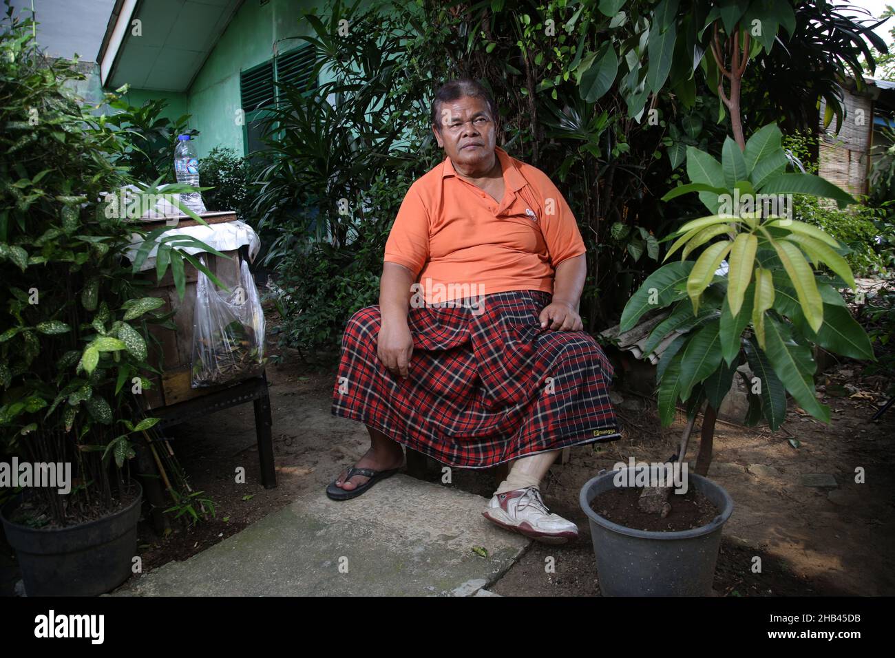 Bekasi, West Java, Indonesia. 16th Dec, 2021. Suparni, 65, a retired ...