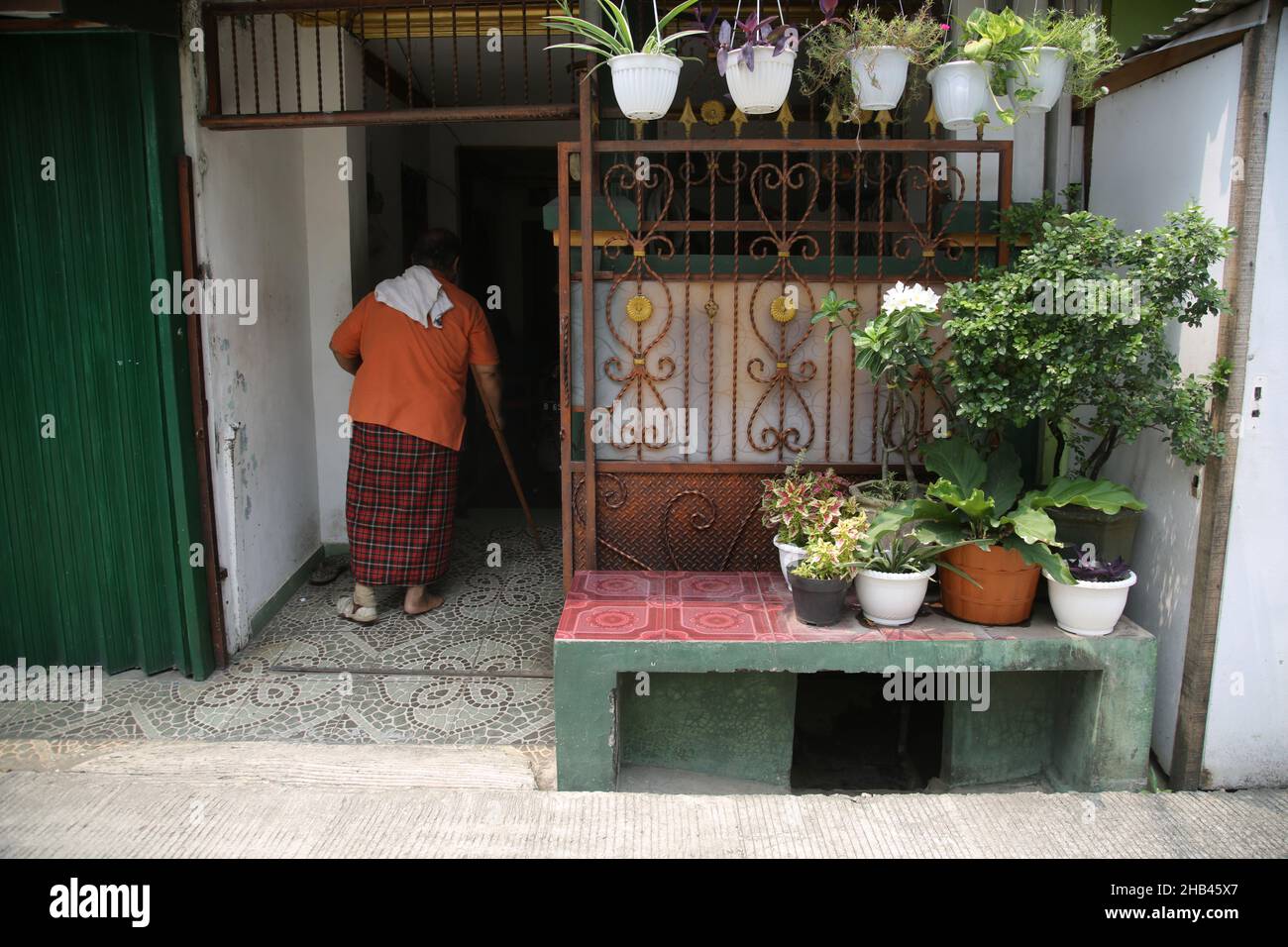 Bekasi, West Java, Indonesia. 16th Dec, 2021. Suparni, 65, a retired ...