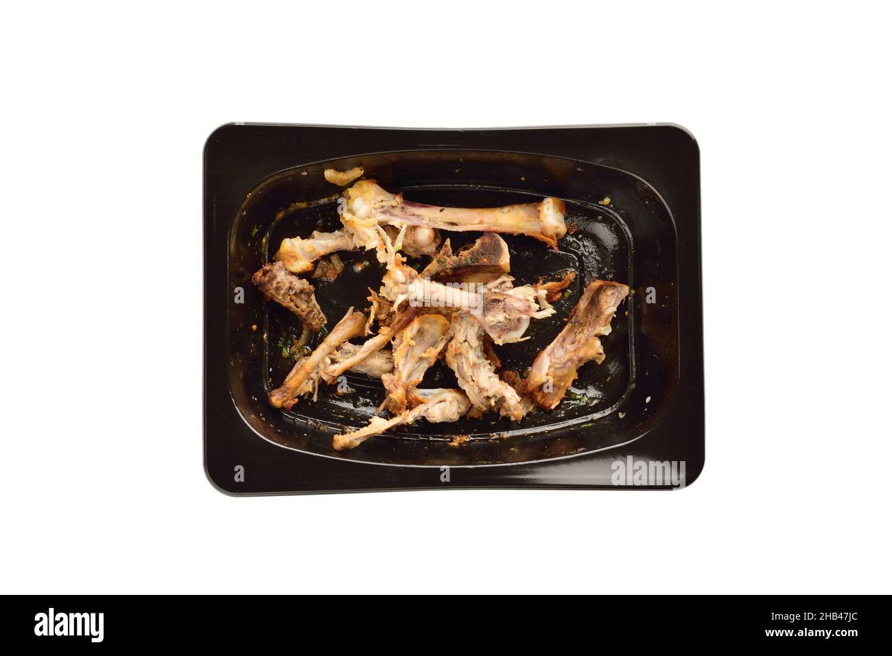 Leftover Chicken Bones in Container Isolated on White Background with ...