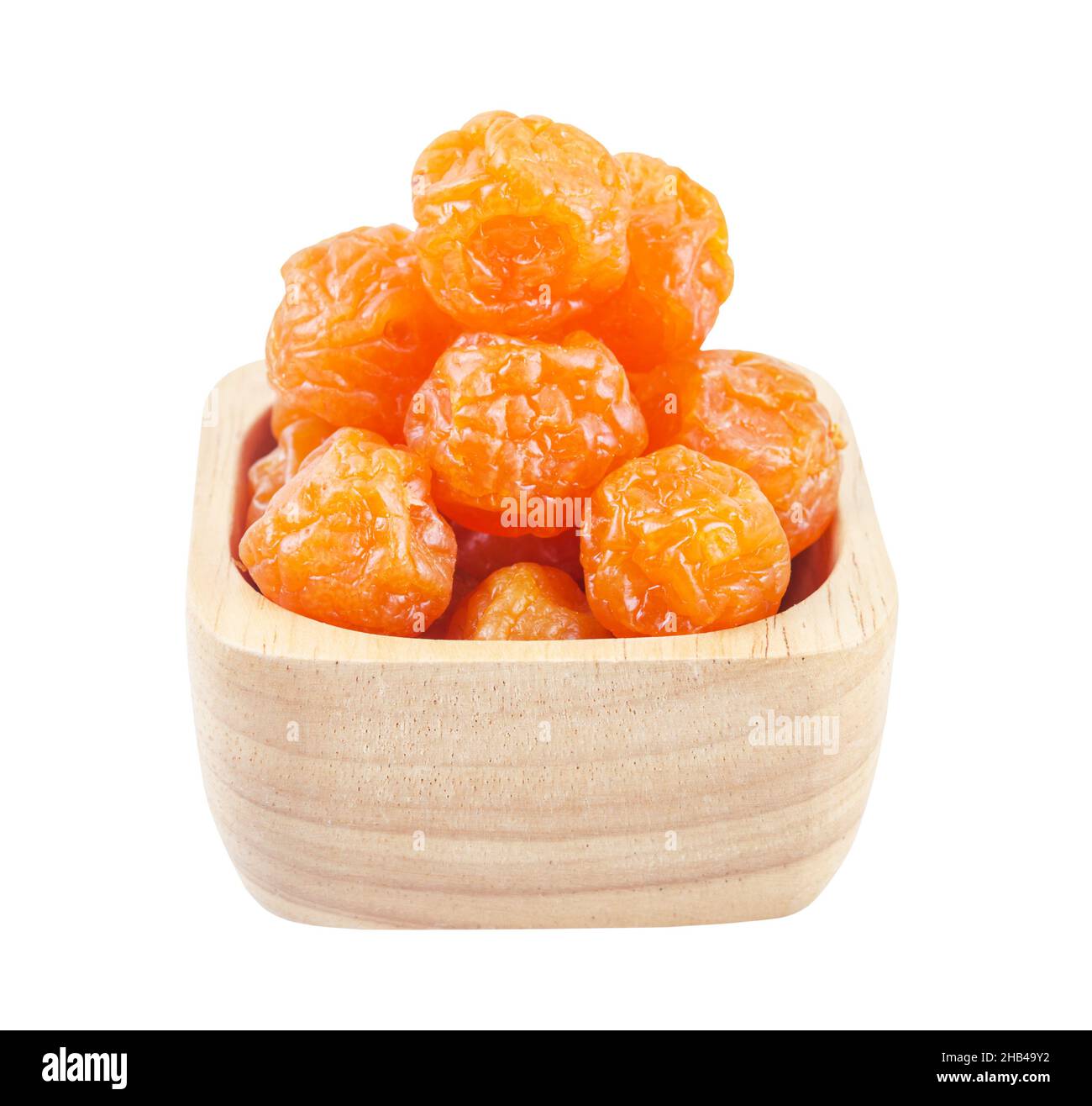 Dried prunes fruits (Preserved fruits Chinese plum) in wooden bowl ...
