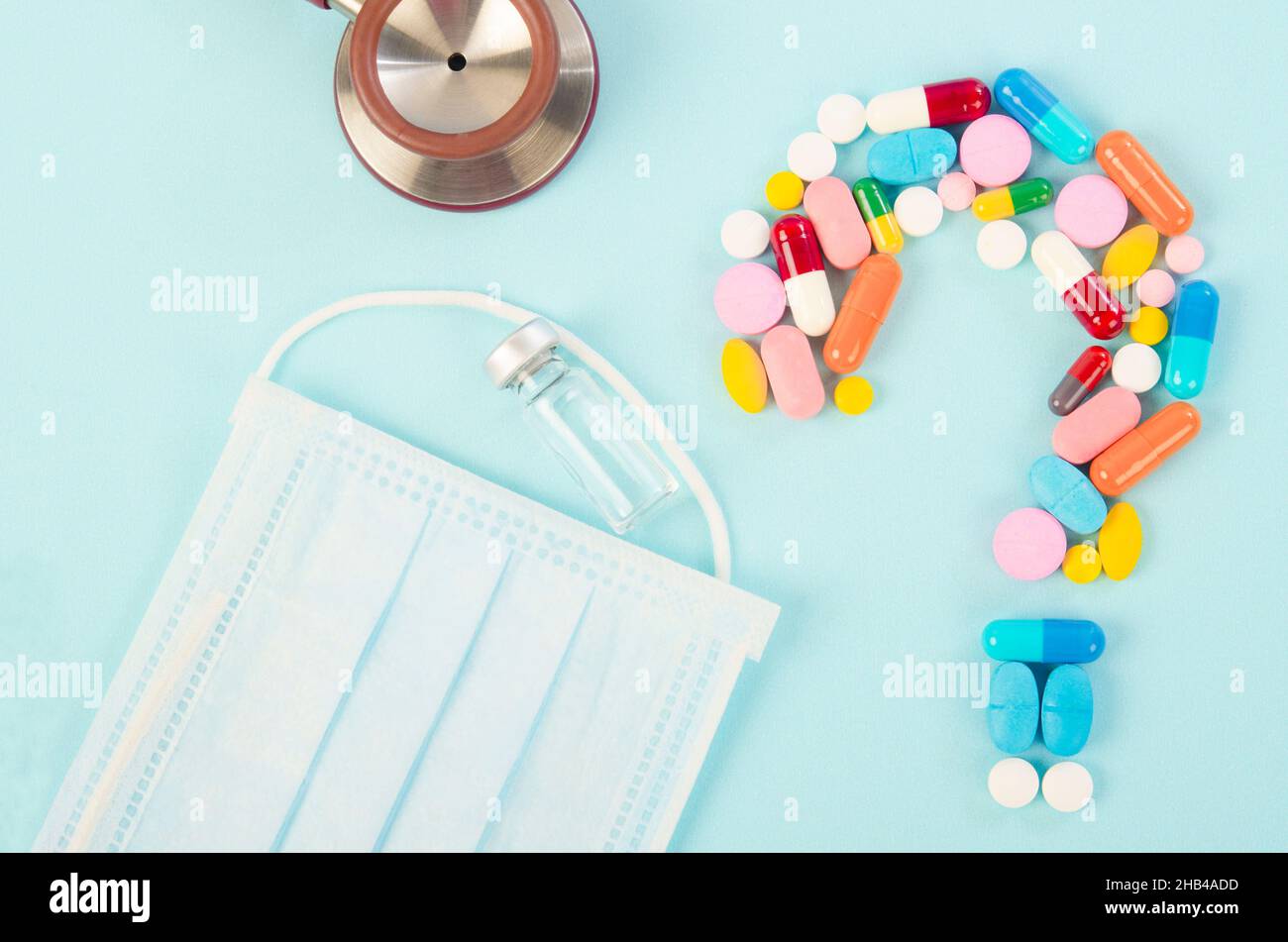 Vaccine and pills and protection face mask with stethoscope medication ...
