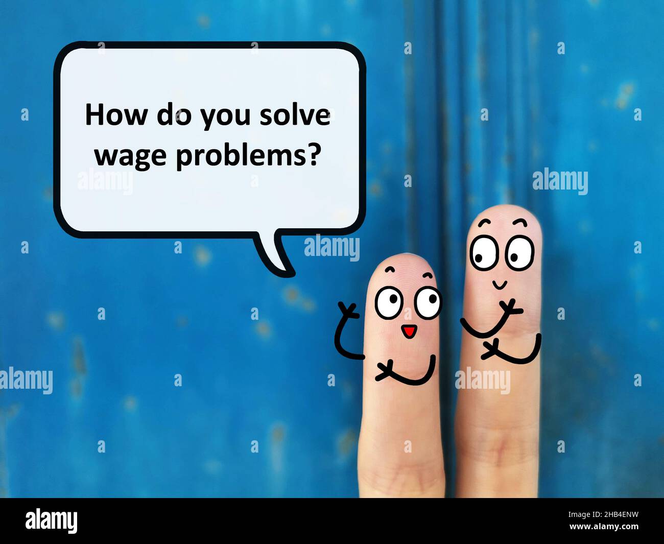 Two fingers are decorated as two person. They are discussing about ...