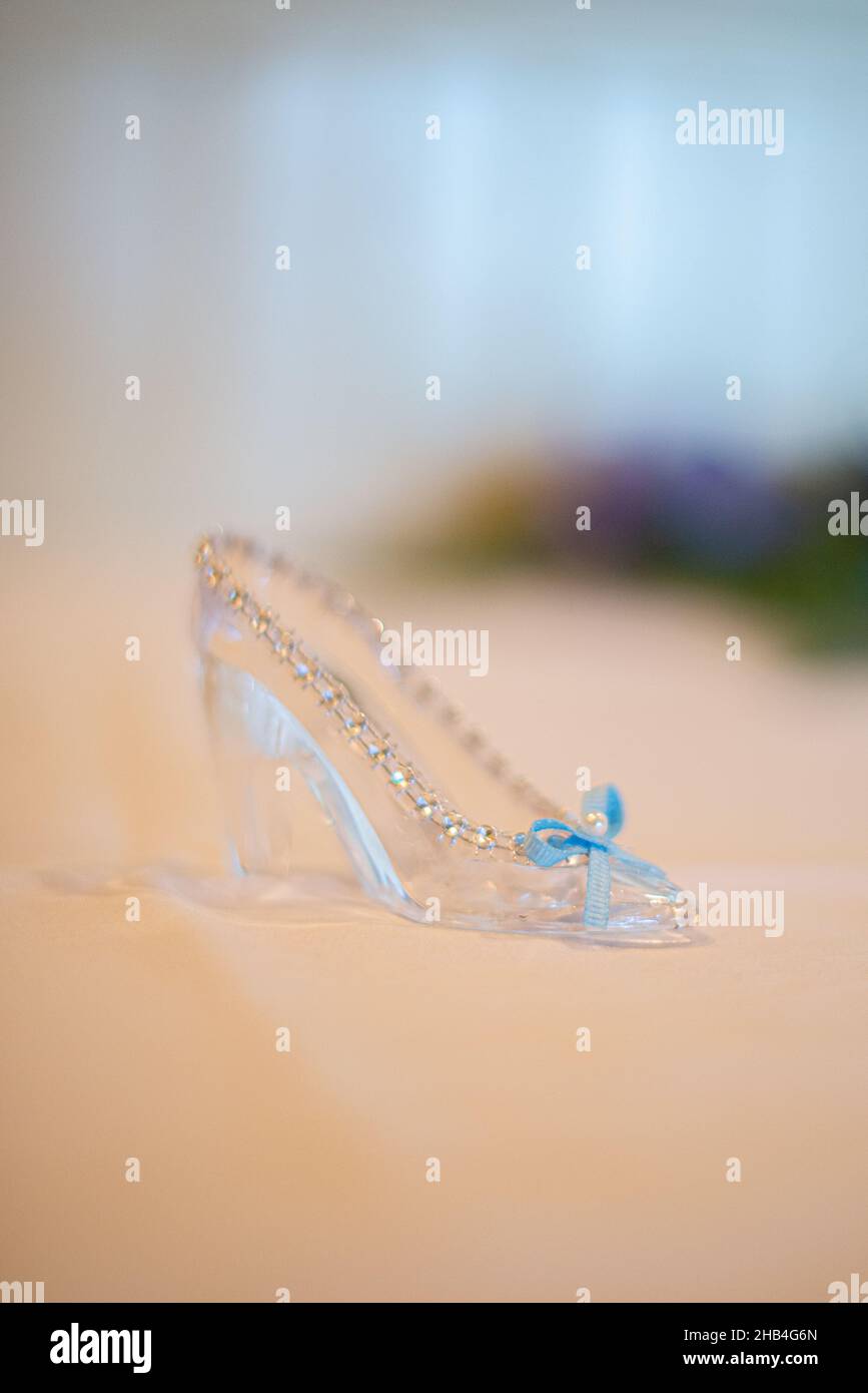Miniature cinderella's glass slipper with blue bow cake topper Stock ...