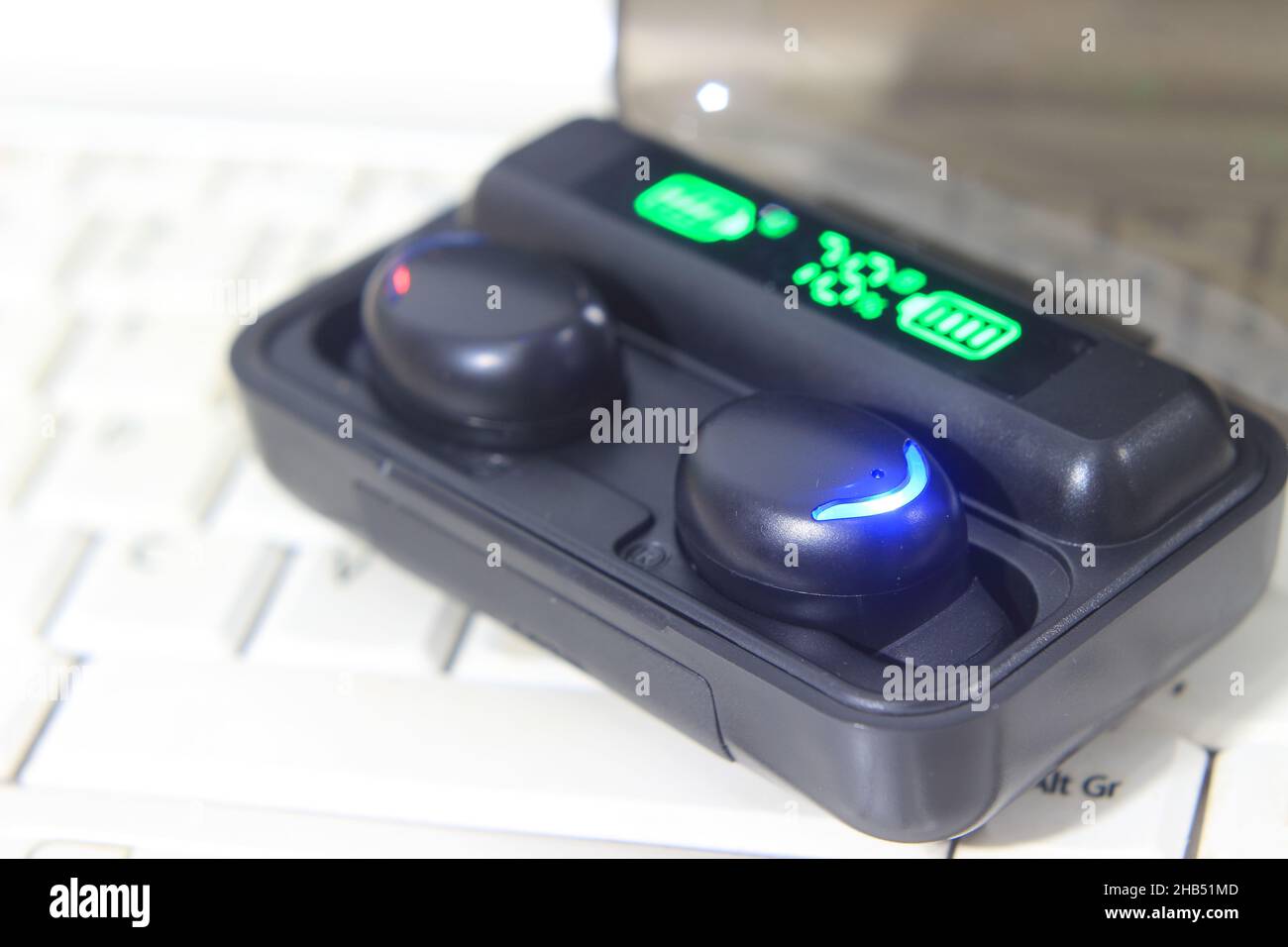TWS or True Wireless Stereo at White Notebook Stock Photo - Alamy