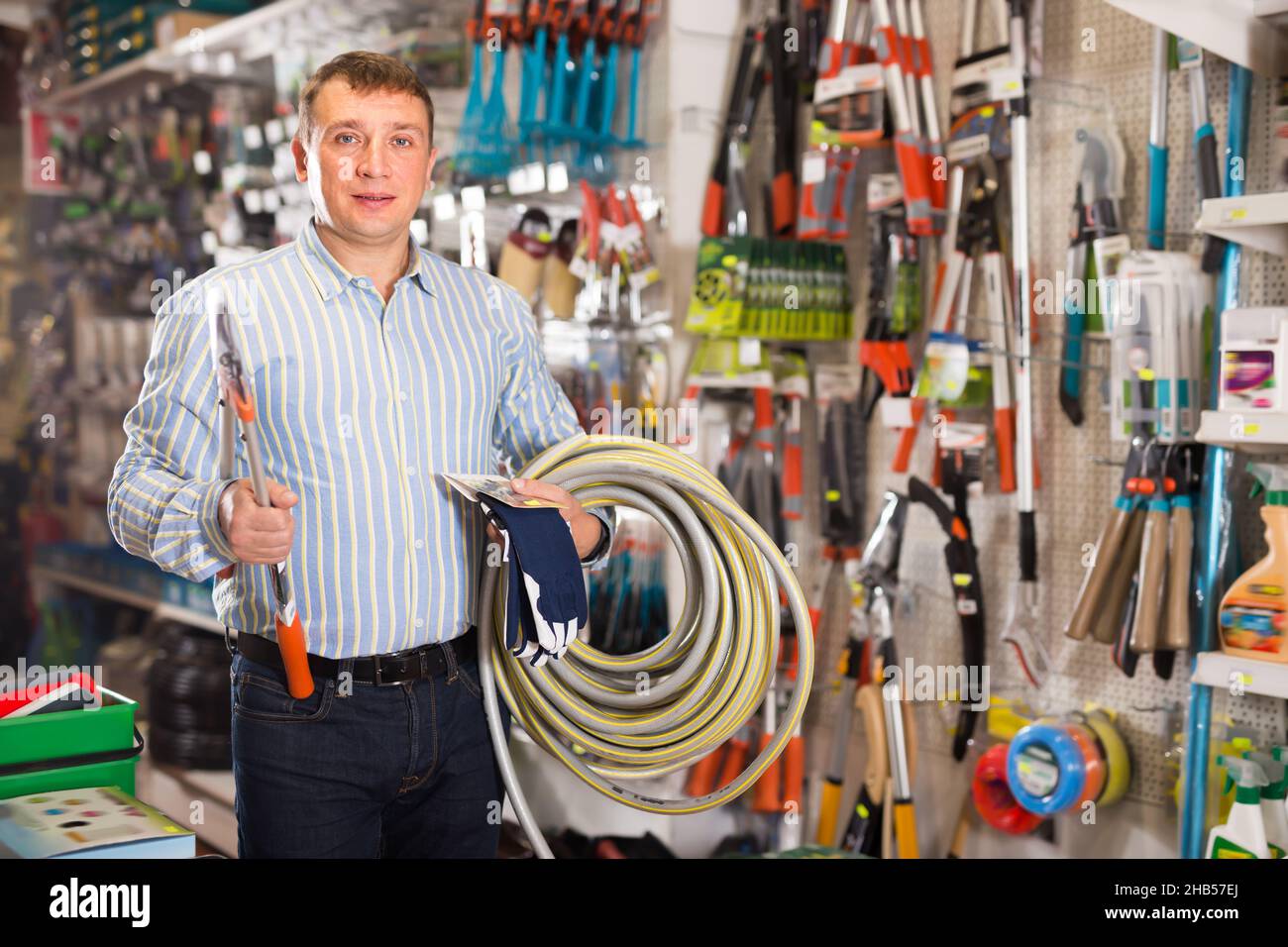 Portrait of male in hardware store Stock Photo - Alamy