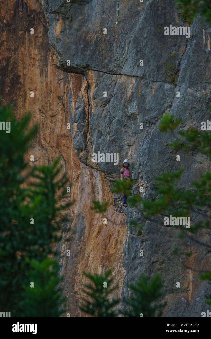 Young woman practices rock climbing in Chulilla. Valencia. December ...