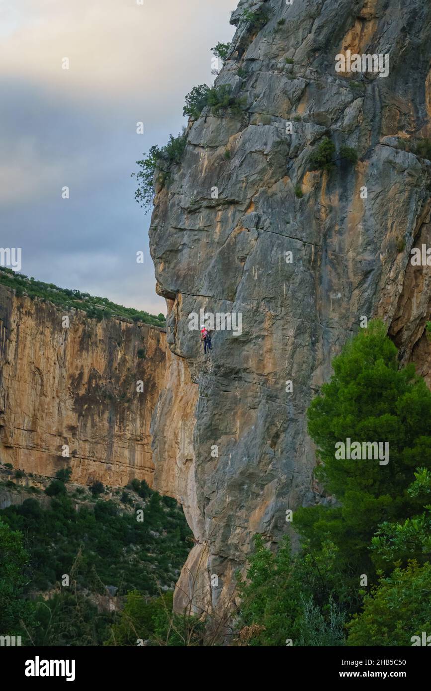 Young woman practices rock climbing in Chulilla. Valencia. December ...