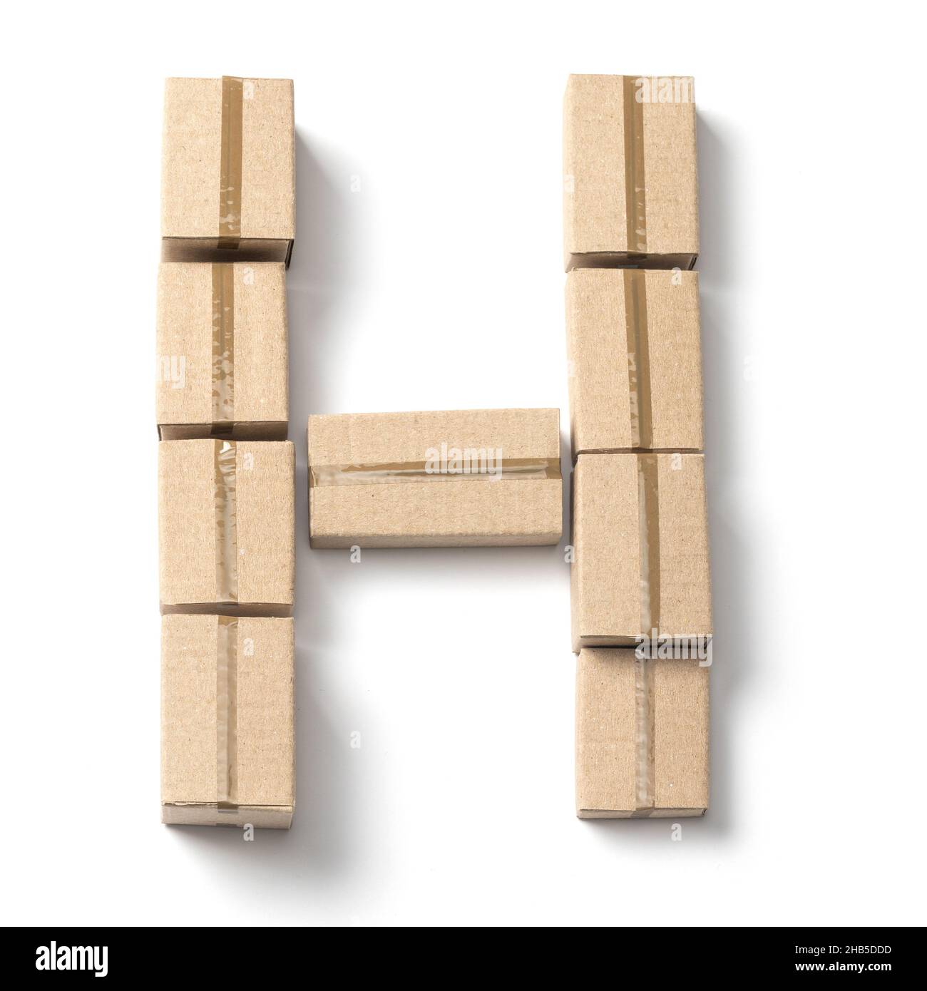 Letter H. Alphabet from cardboard boxes for delivery isolated on white ...