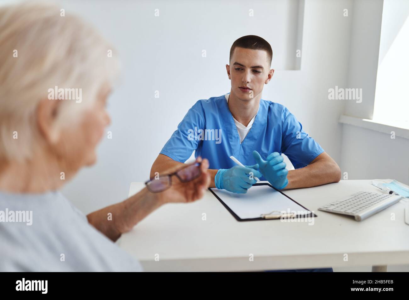 patient at the doctor's appointment health care Stock Photo - Alamy