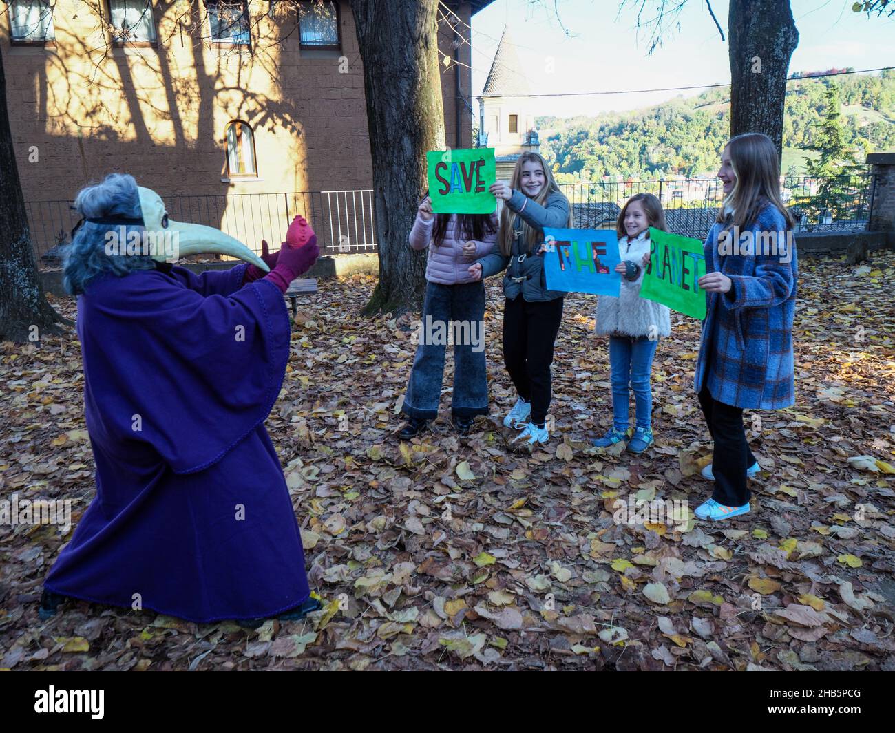ecologist children girls playing to save the planet as evil toxic ...
