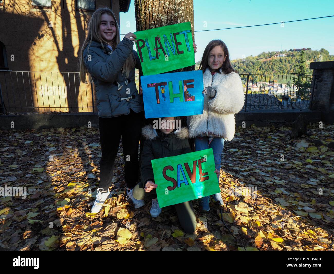 ecologist children girls playing to save the planet as evil toxic ...
