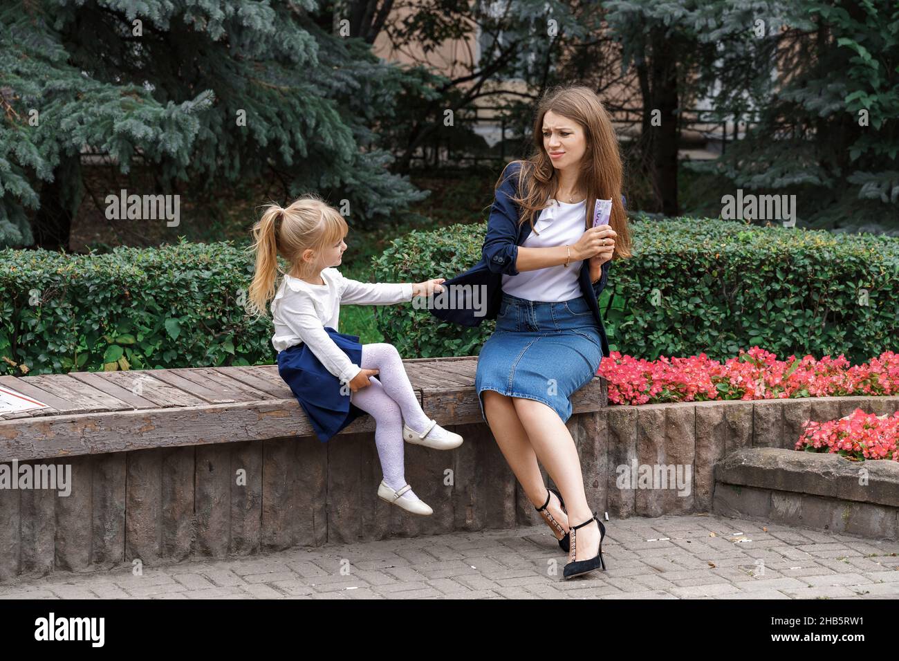 mom has problems raising her little daughter. girl asks for money, mom ...