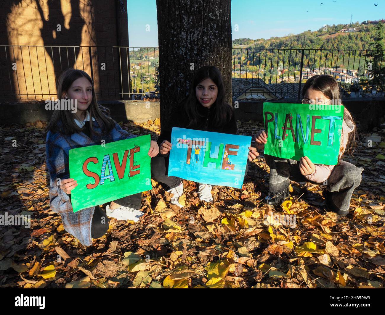 ecologist children girls playing to save the planet as evil toxic ...