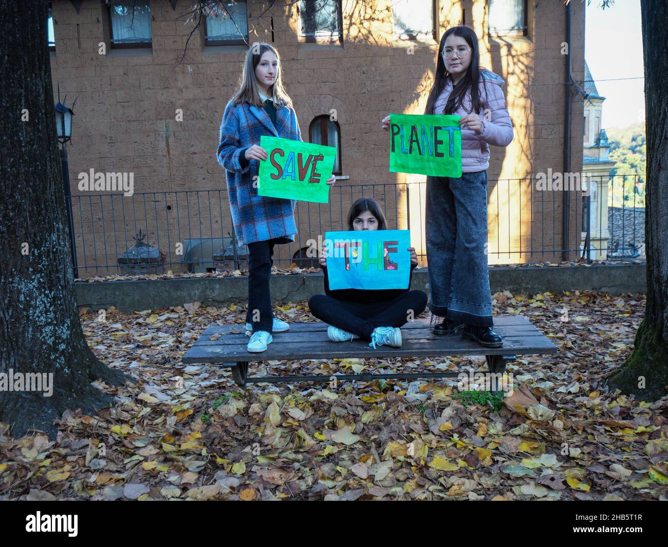ecologist children girls playing to save the planet as evil toxic ...
