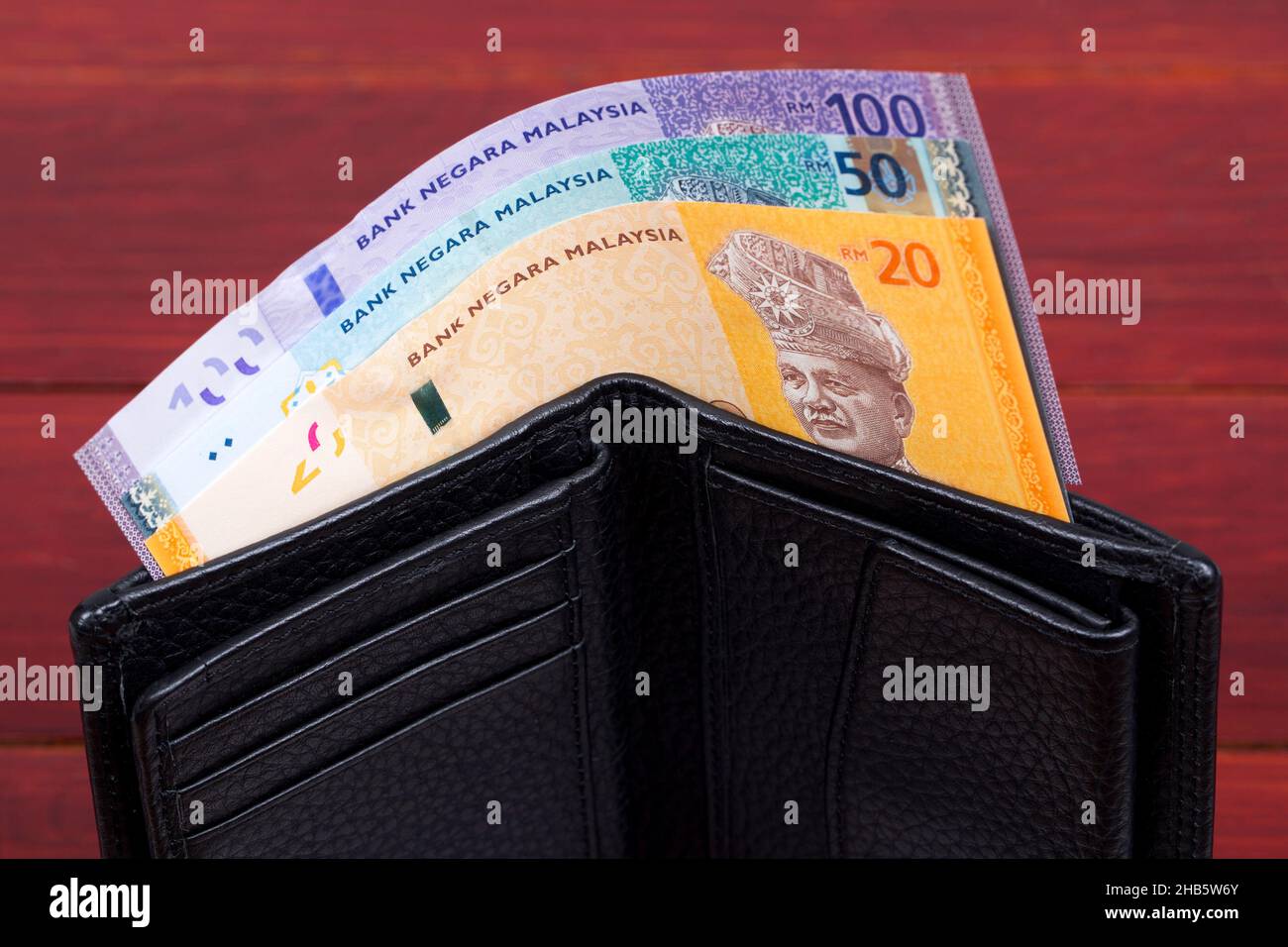 Malaysian money - ringgit in the black wallet Stock Photo - Alamy